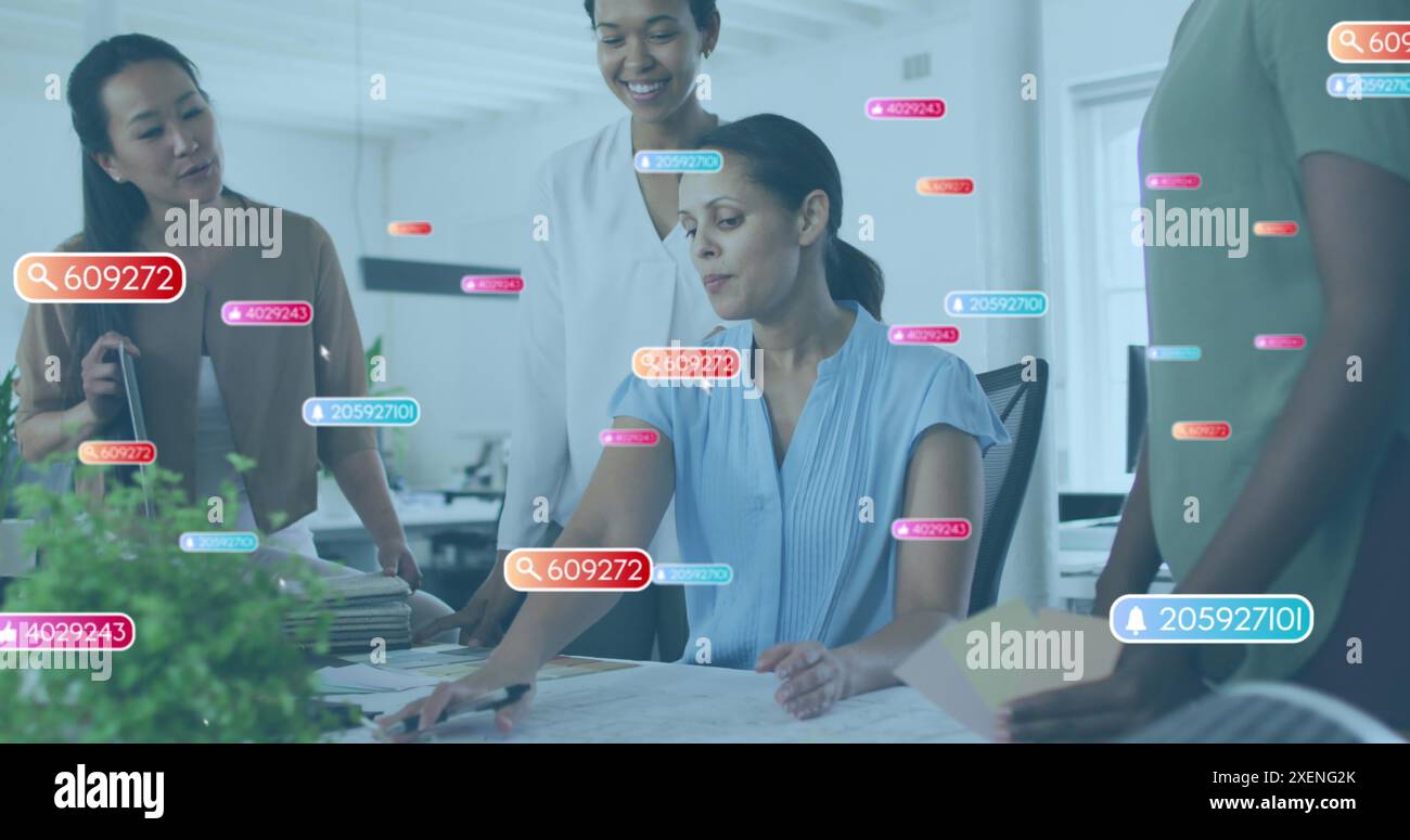 Image of numbers in bars over diverse female coworkers sharing ideas in ...