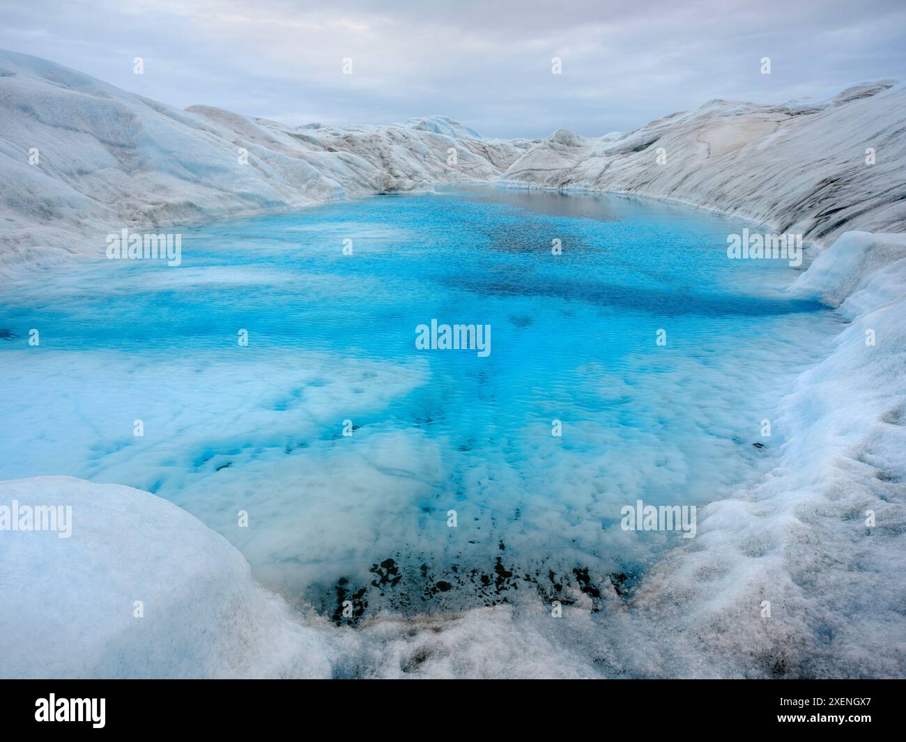 Drainage system with lake on the surface of the ice sheet. The brown ...