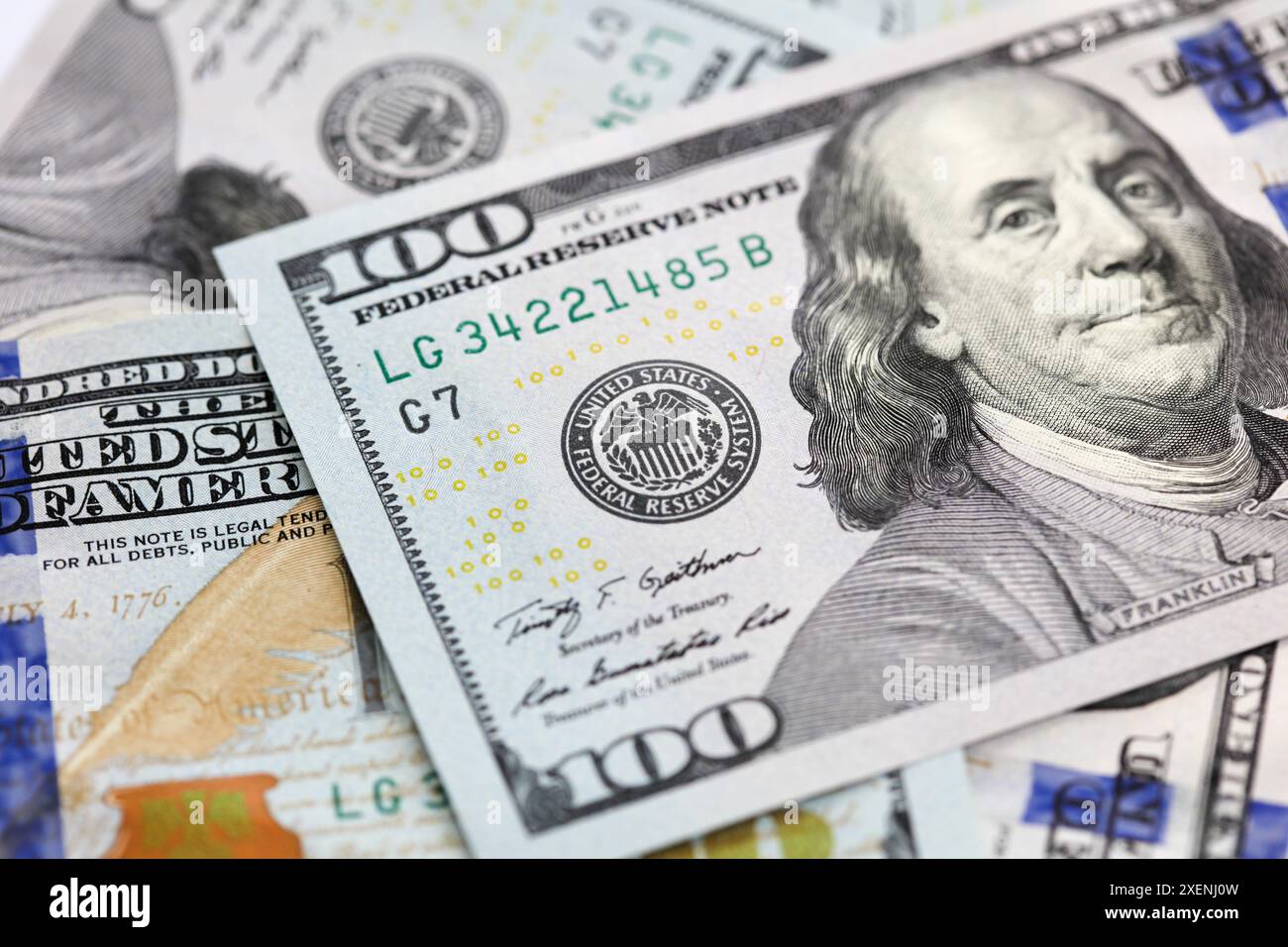 A closeup of United States of an American 100 dollar notes featuring ...