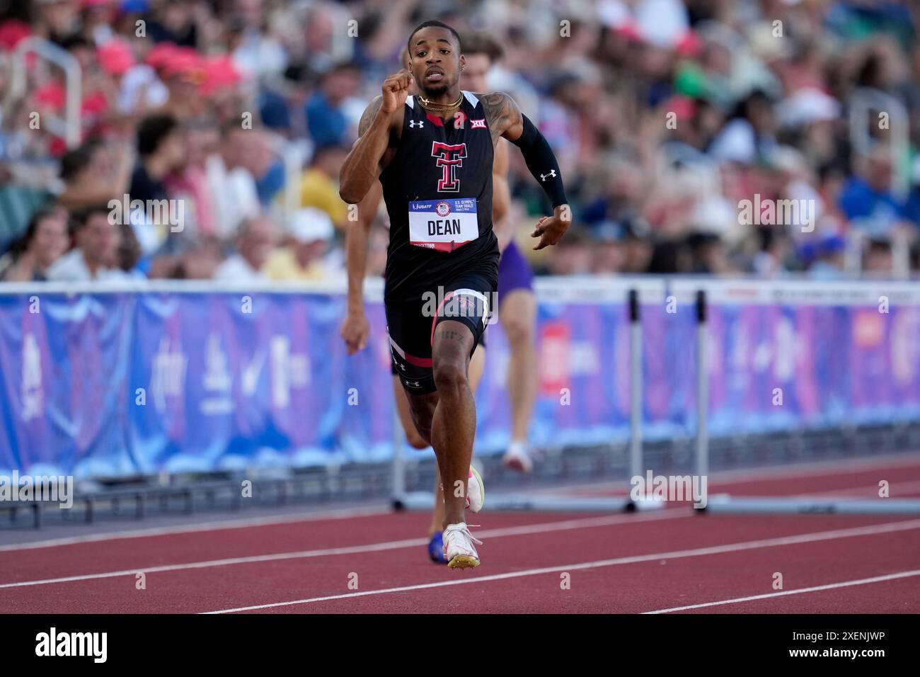 Caleb Dean wins a heat men's 400-meter hurdles semi-finals during the U ...