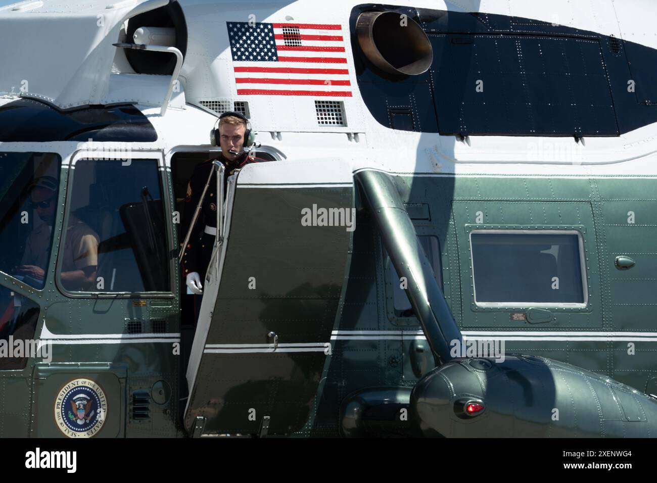 Queens, United States. 28th June, 2024. A US Marine with a headset on ...