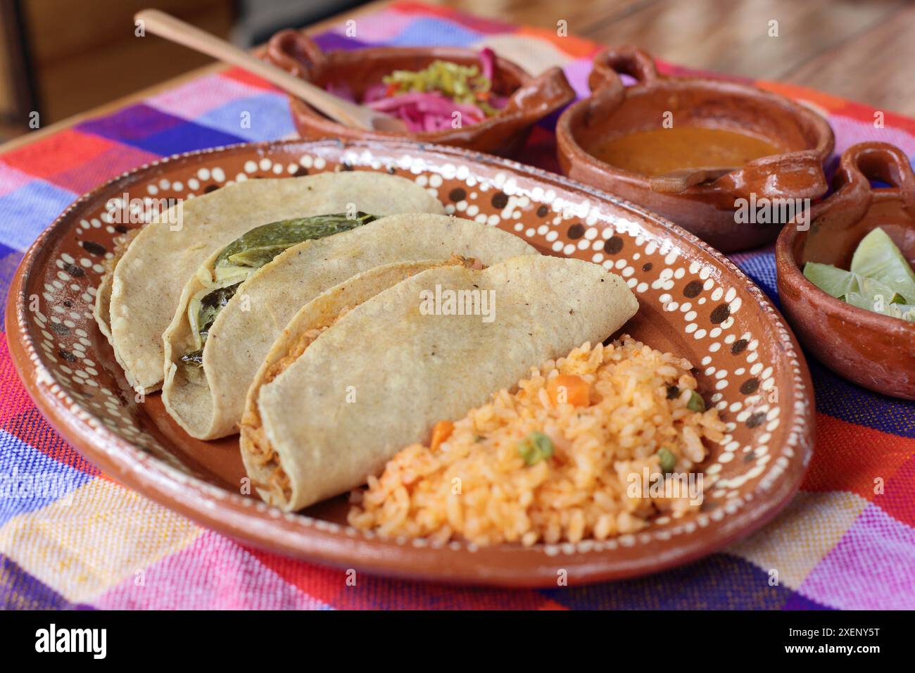 Traditional tacos known as tacos de guisado Stock Photo - Alamy