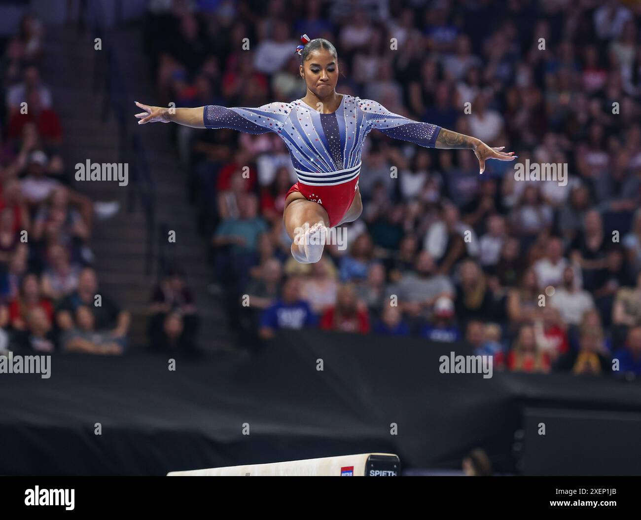 June 28, 2024: Jordan Chiles leaps into the air on the balance beam at ...