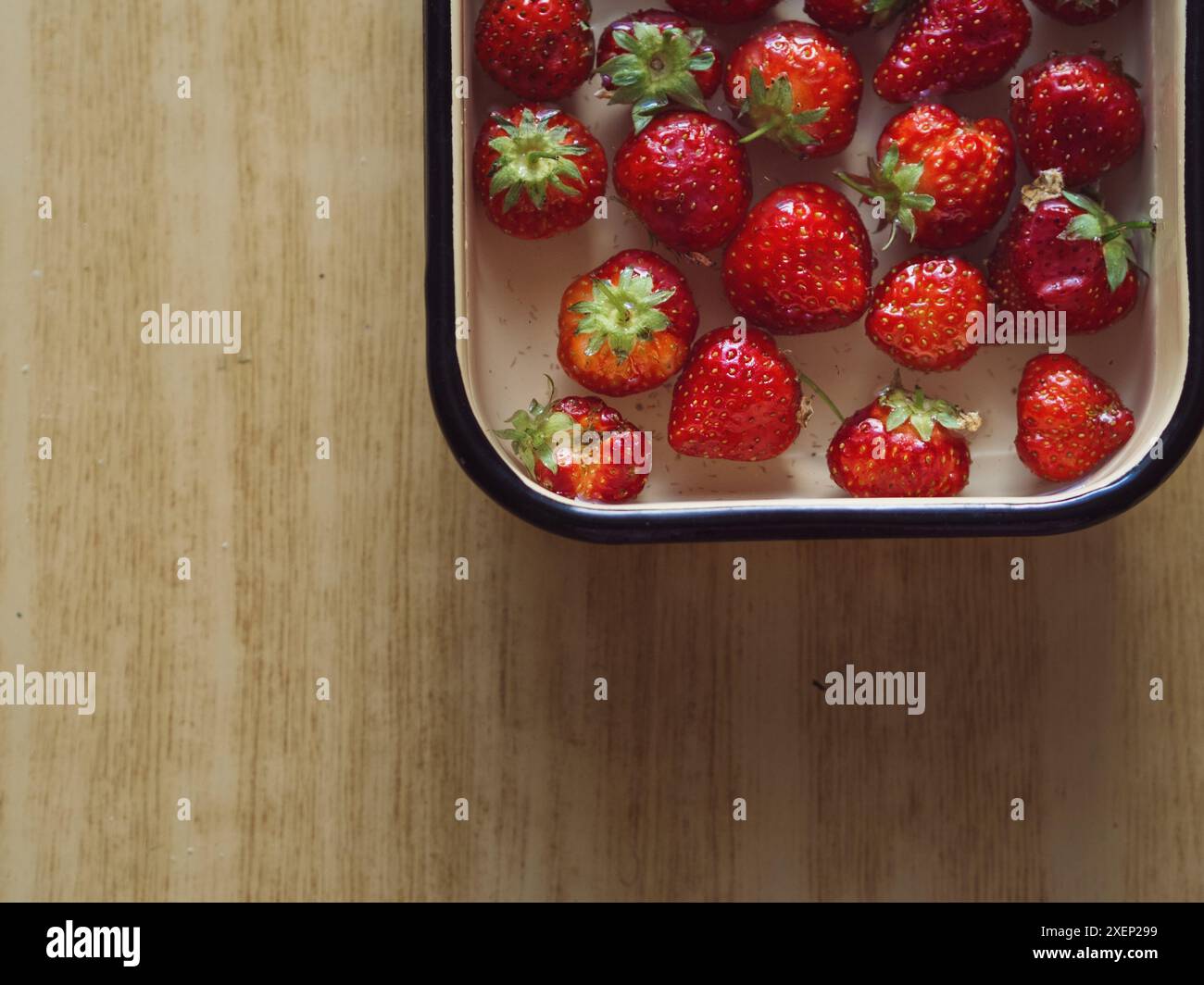 Strawberries in Water in a Rectangle Metal Container on the Kitchen ...
