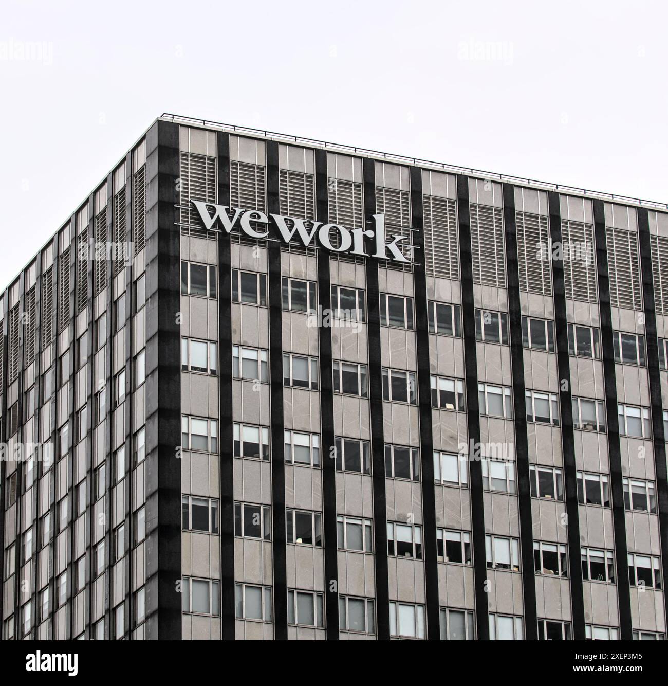 Brooklyn, NY - Jan 15, 2023: Wework coworking space company sign on ...