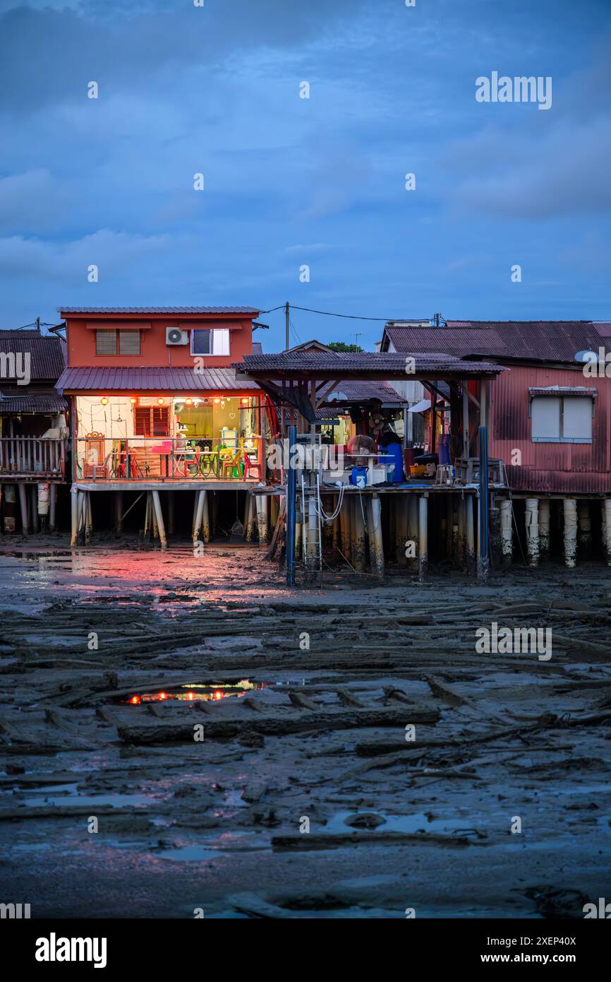 Rustic houses on stilts at the Chew Jetty taken from the Tan Jetty at ...