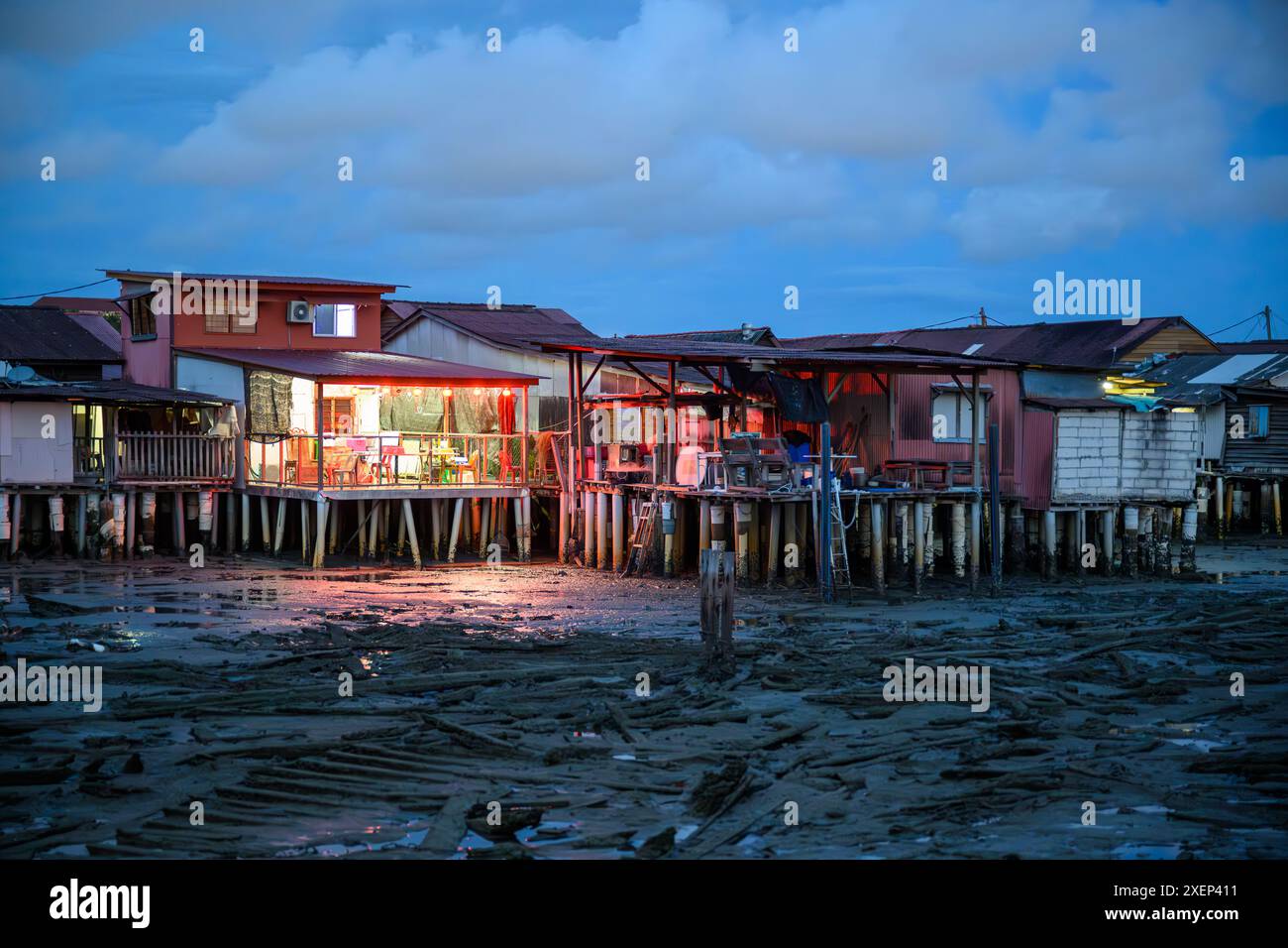 Rustic houses on stilts at the Chew Jetty taken from the Tan Jetty at ...