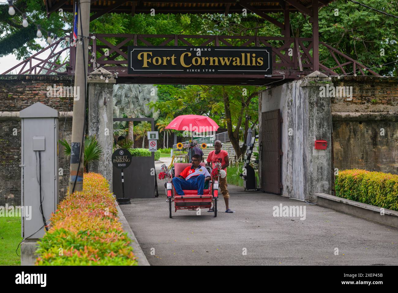 A Penang Trishaw at the entrance to Fort Cornwallis, George Town ...