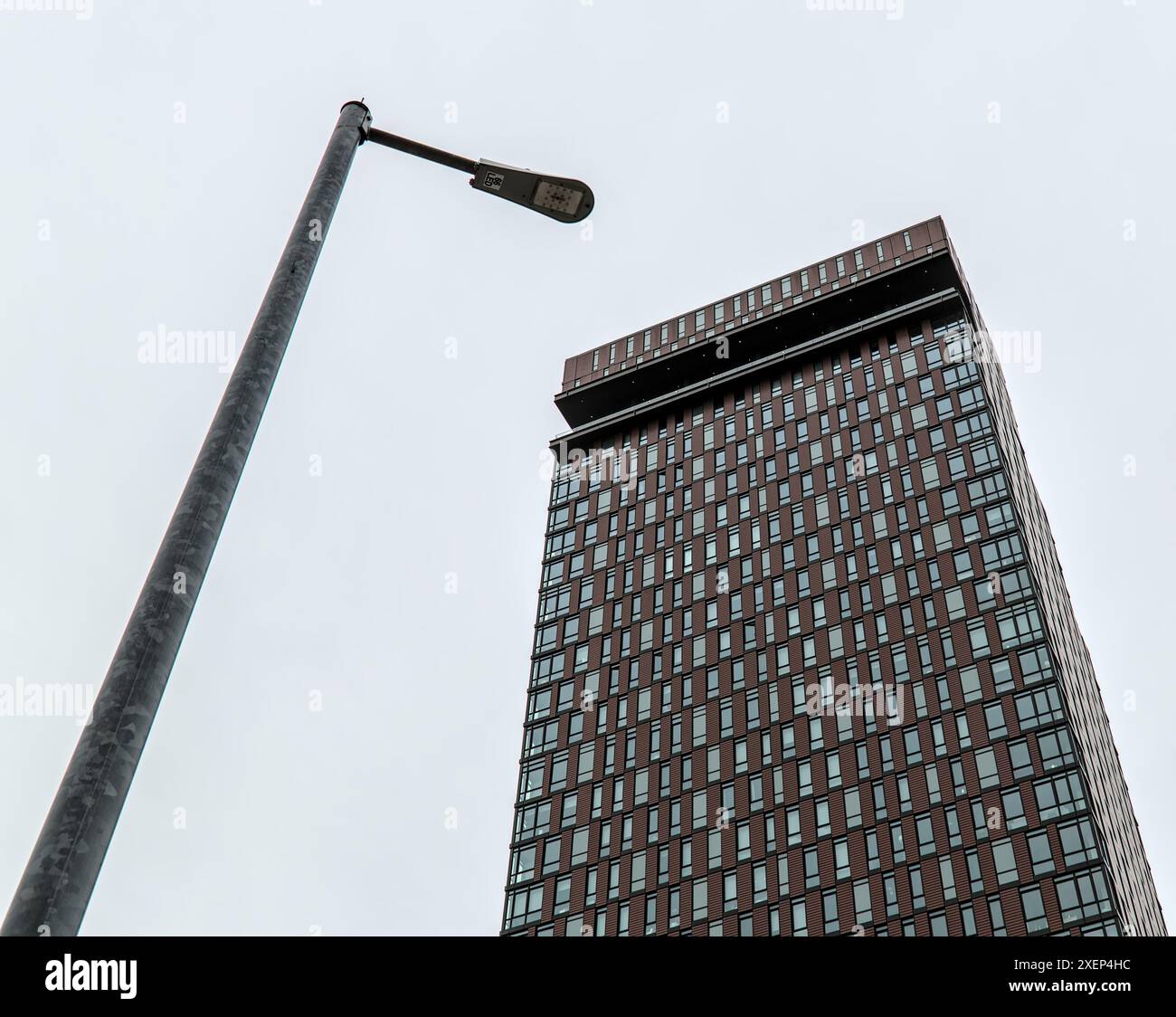 tall residential building tower (looking up at high rise apartment ...
