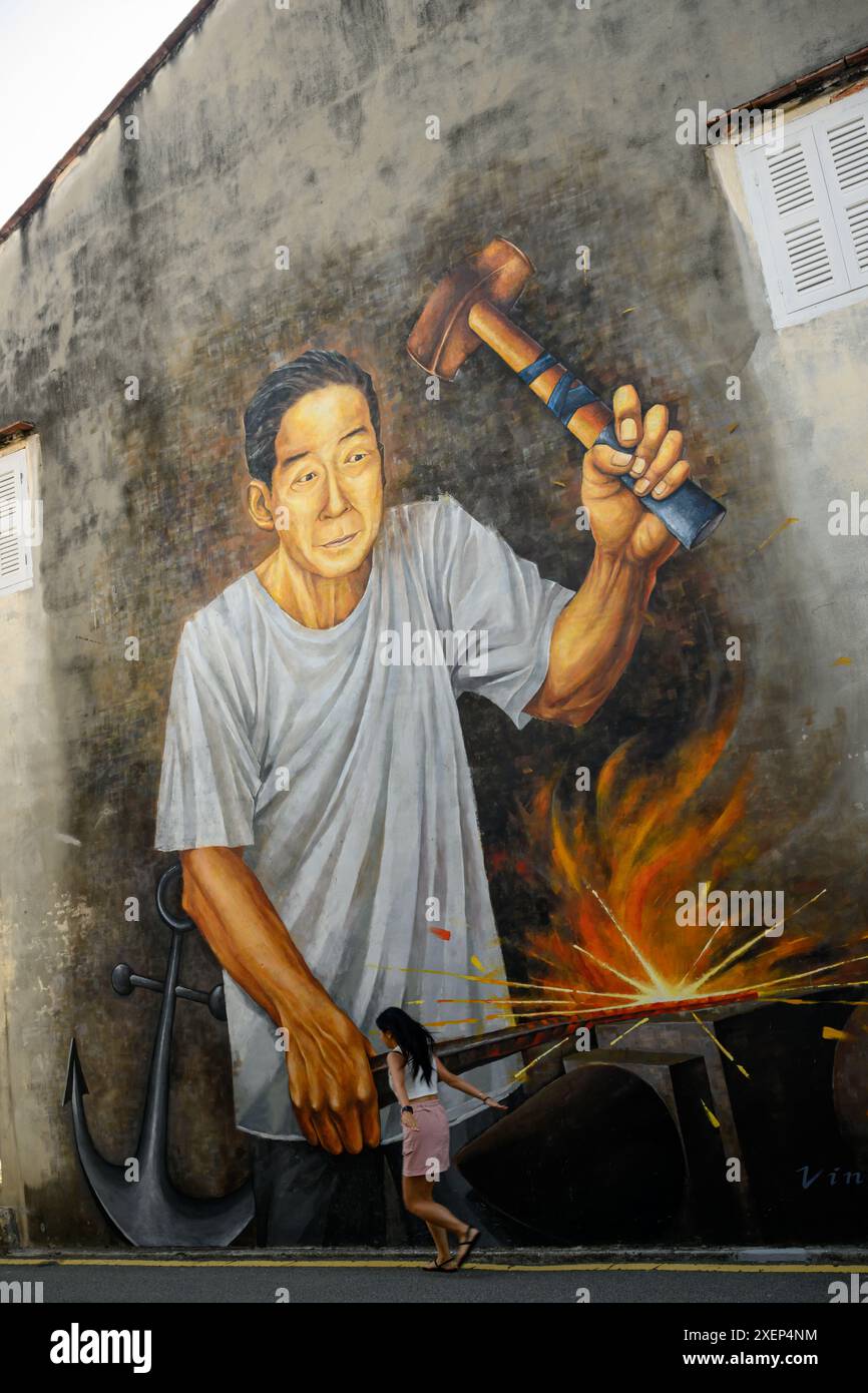 Man with the anvil street art, George Town, Penang, Malaysia Stock ...