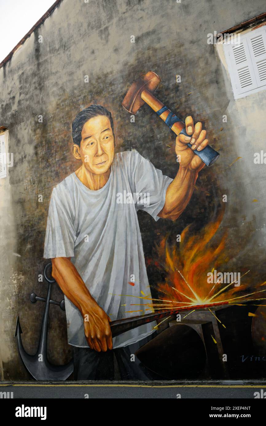 Man with the anvil street art, George Town, Penang, Malaysia Stock ...