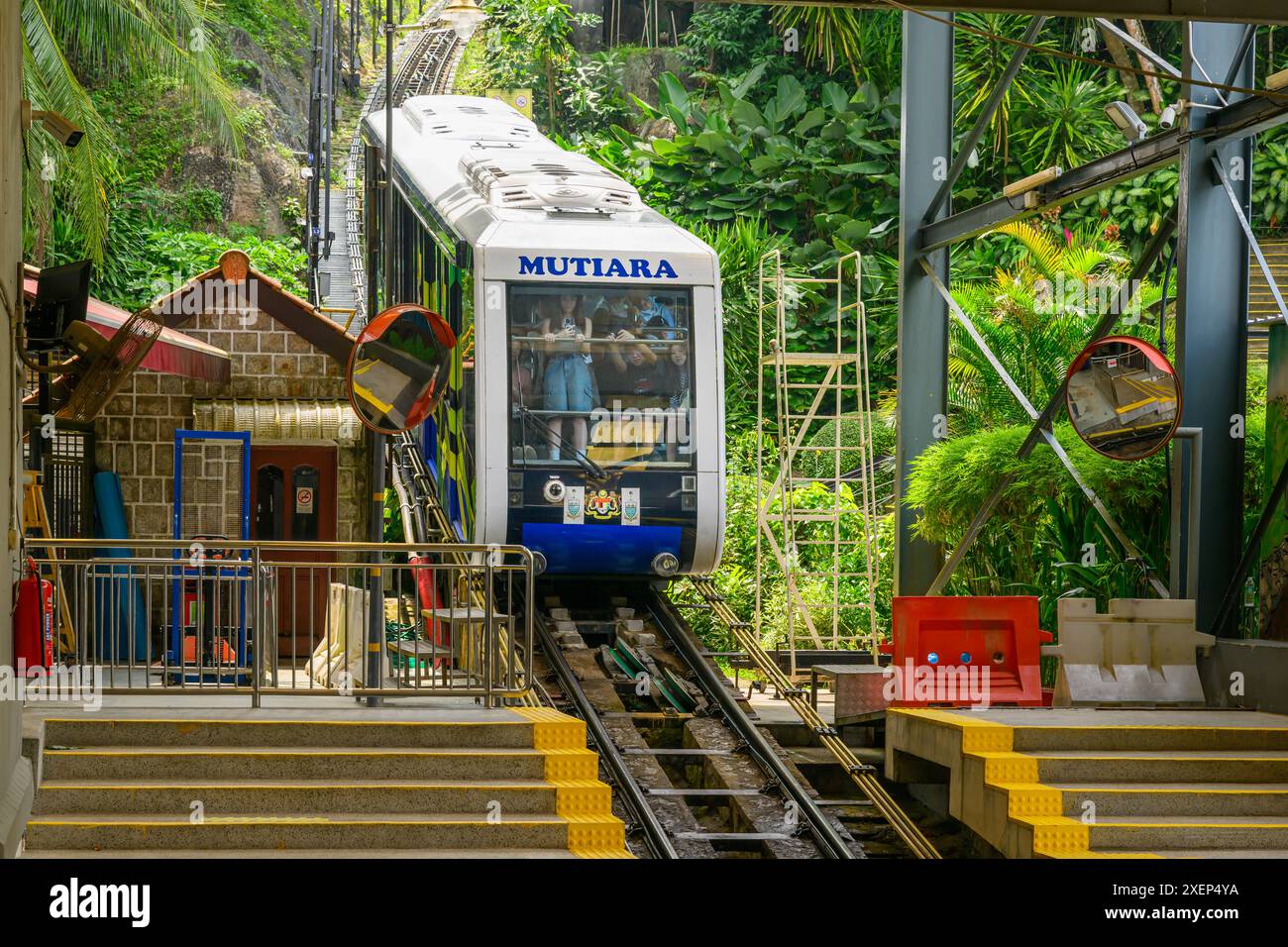 A train approaching the Lowerr Station at Penang Hill, Penang, Malaysia ...