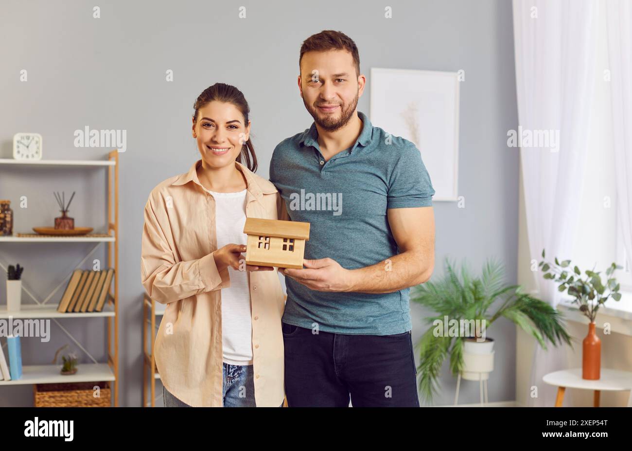 Happy Family Couple Celebrating New Real Estate Purchase Stock Photo ...