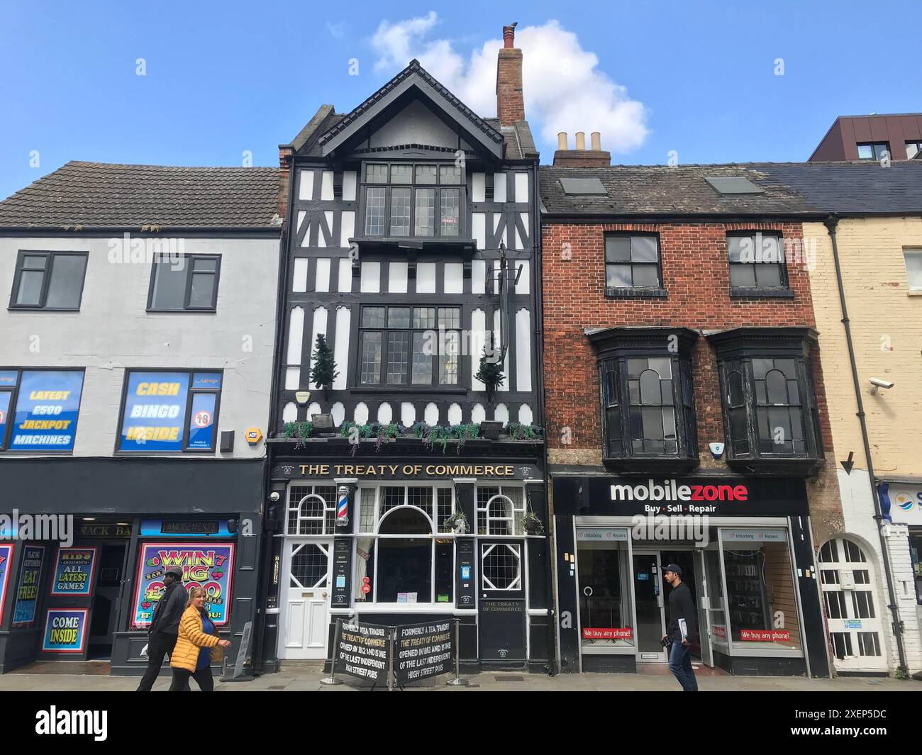 Old shops on the High Street in Lincoln UK Stock Photo - Alamy