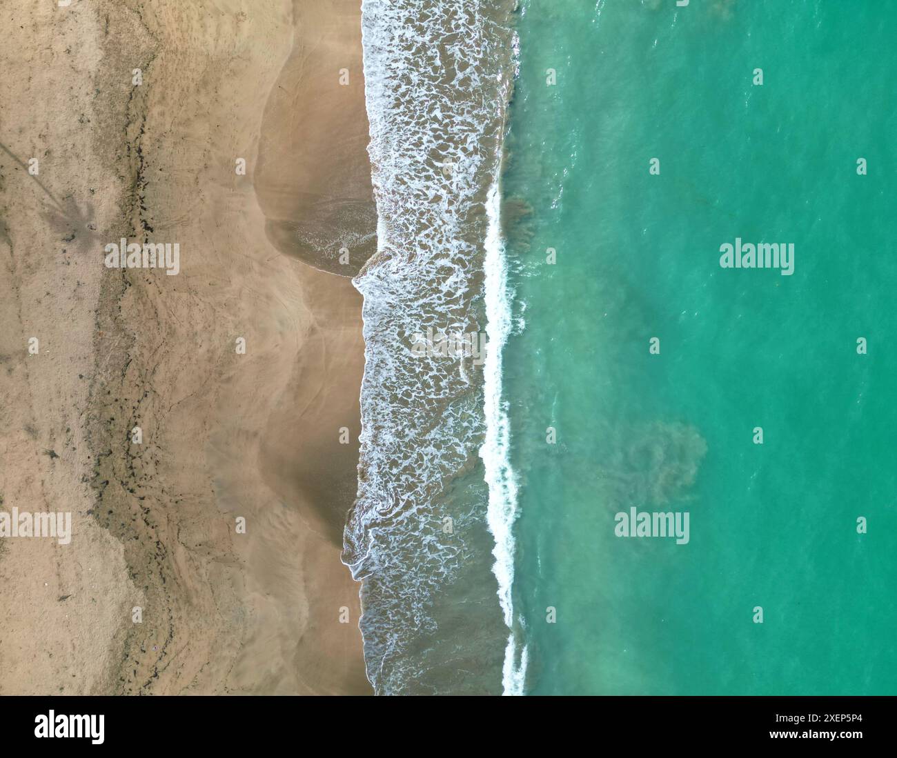 beach water from above (drone shot looking down at turquoise blue green ...