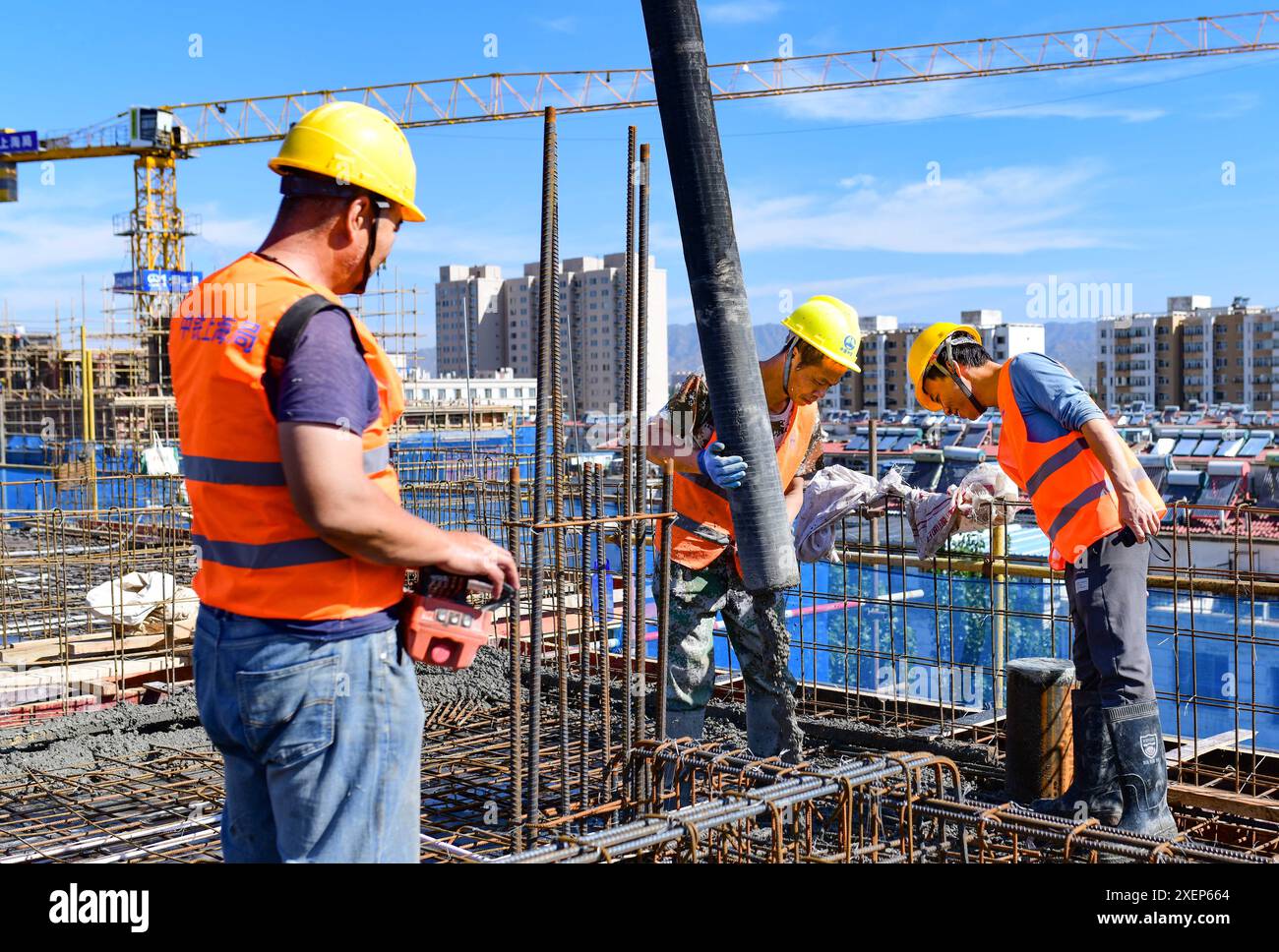 BAOTOU, CHINA - JUNE 29, 2024 - Builders work at the construction site ...