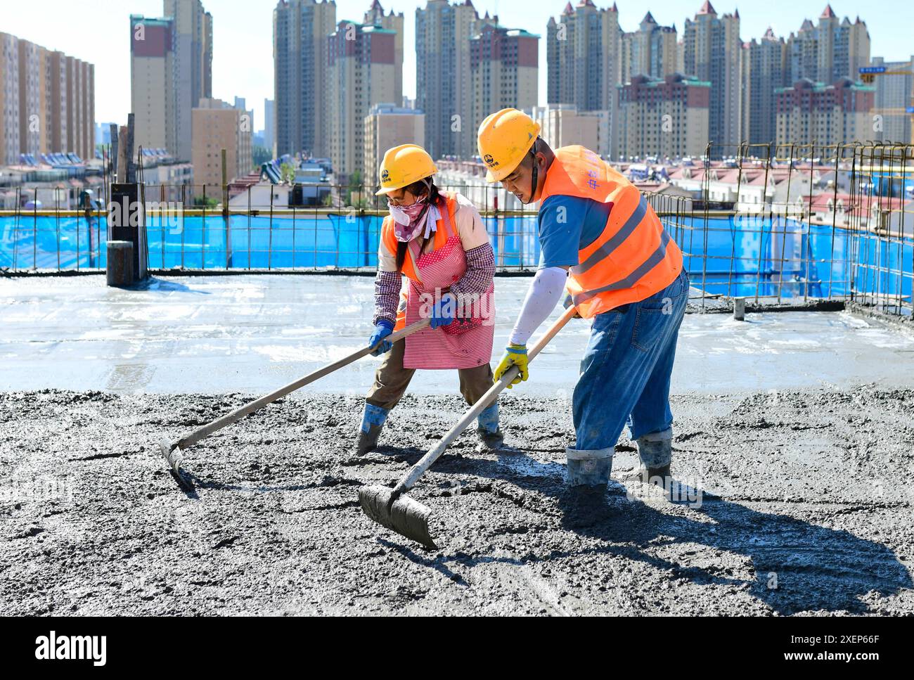BAOTOU, CHINA - JUNE 29, 2024 - Builders work at the construction site ...