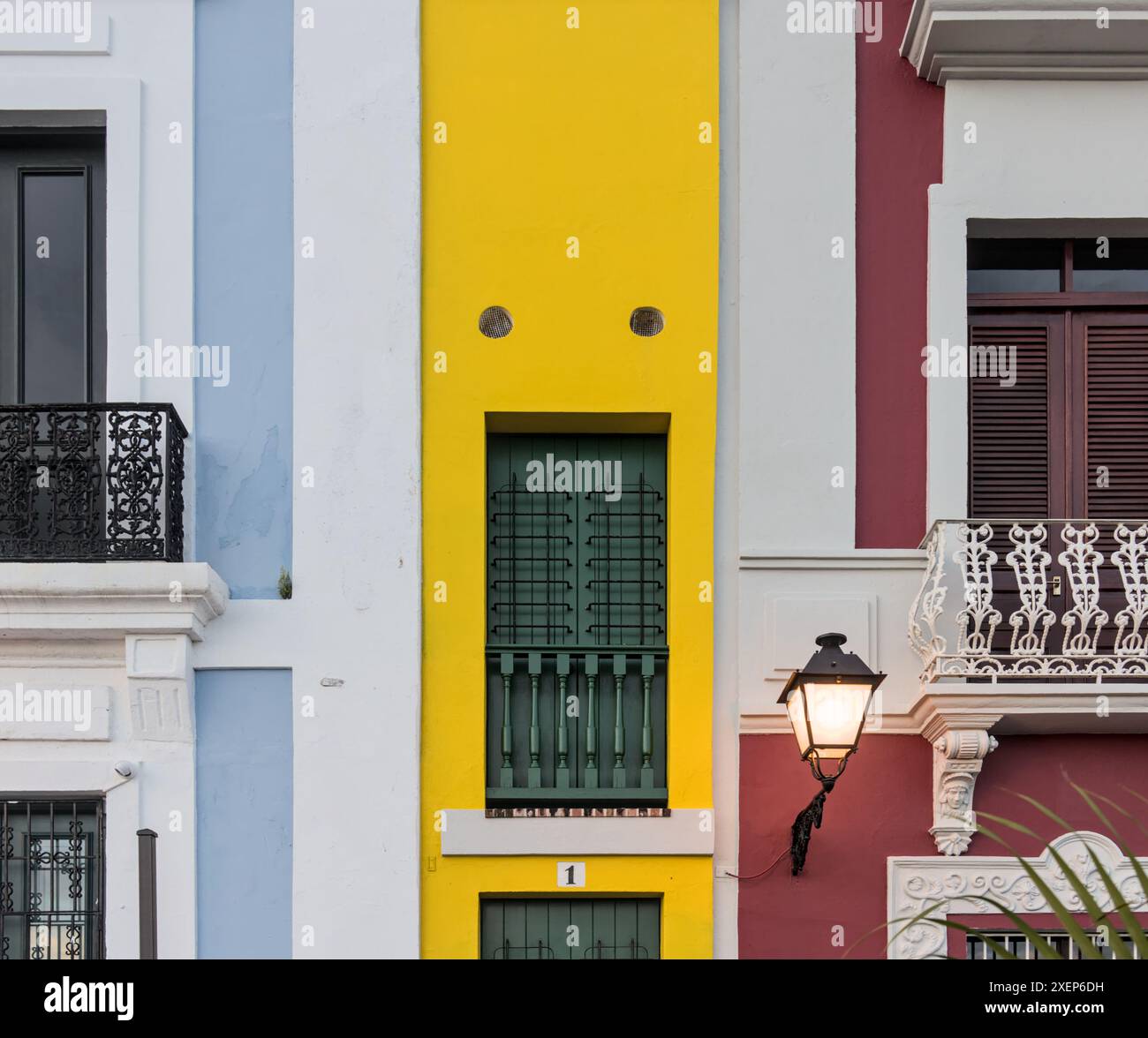 colorful colonial houses on calle tetuan in old san juan, puerto rico ...
