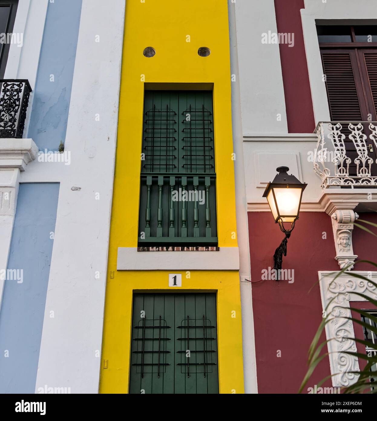colorful colonial houses on calle tetuan in old san juan, puerto rico ...