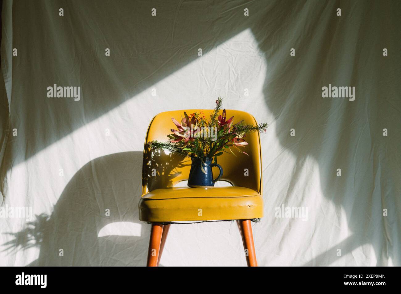 Chair flowers hi-res stock photography and images - Alamy