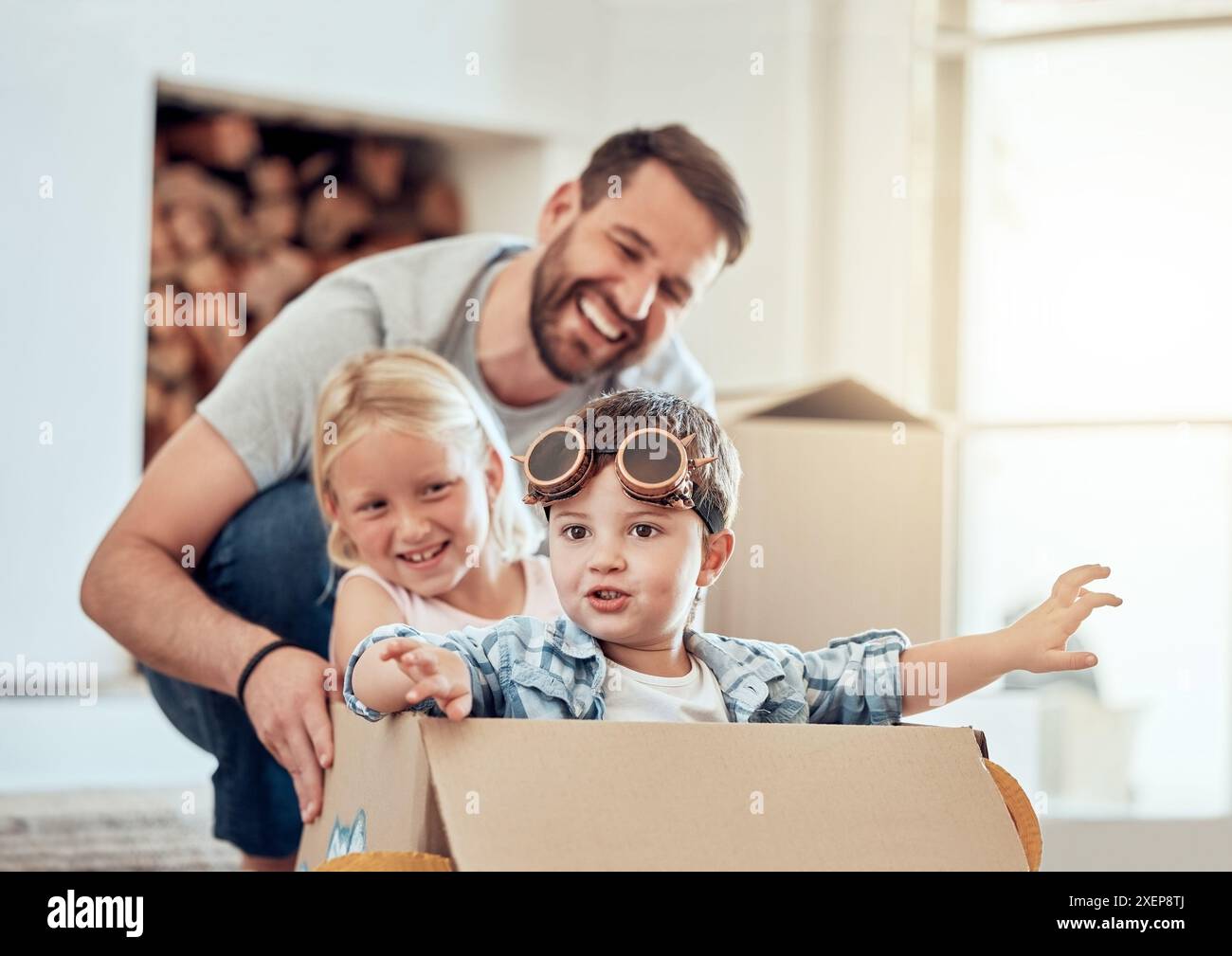 Father, children and home with cardboard airplane for playing ...