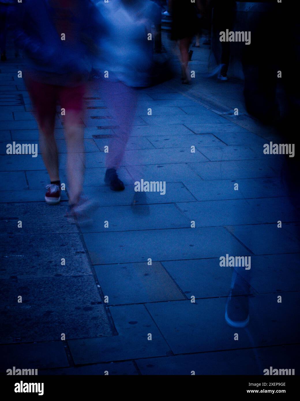 Legs of pedestrians walking shopping or commuting Stock Photo - Alamy