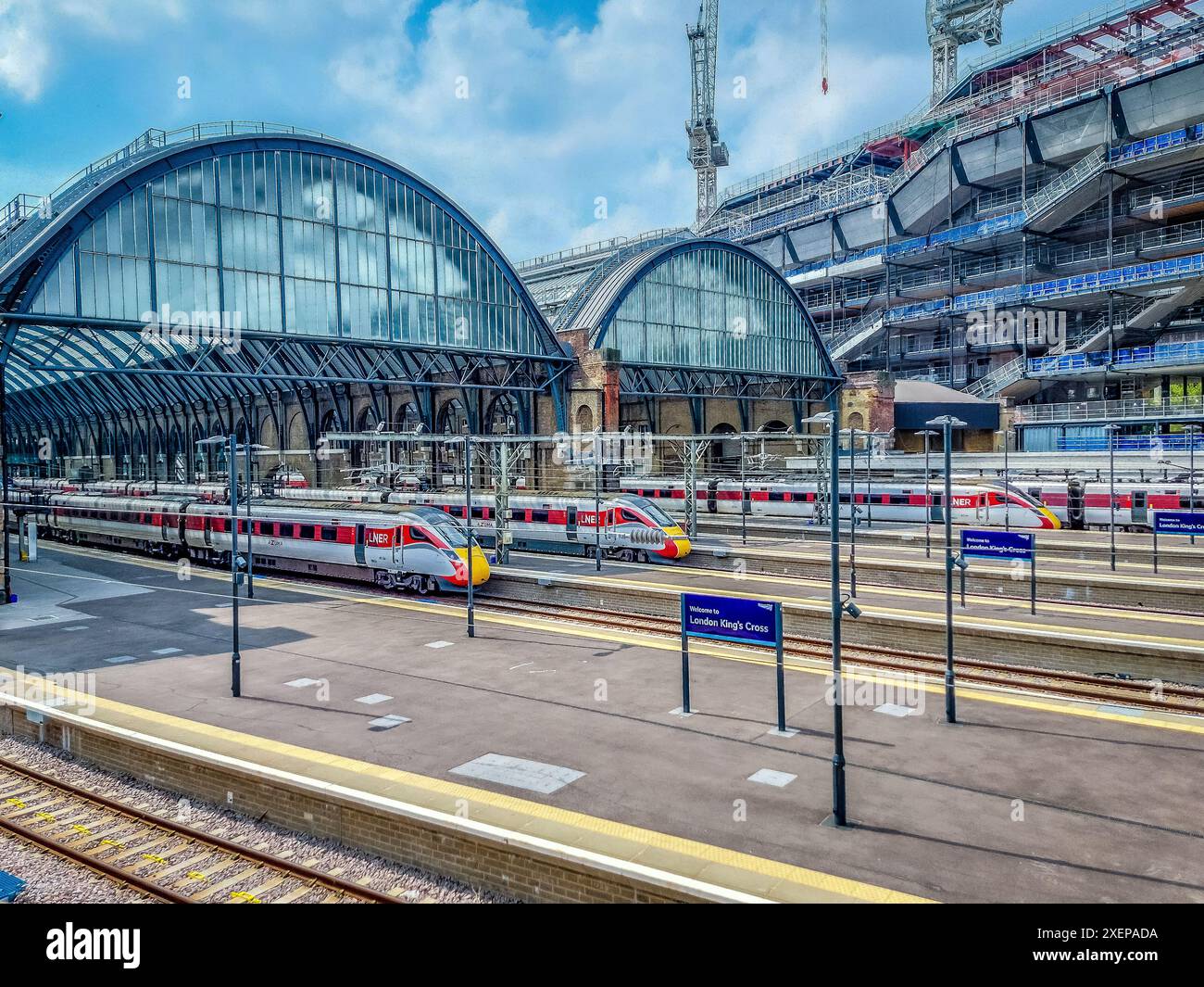 Trains wait at the platform at London's Kings Cross Station Stock Photo ...