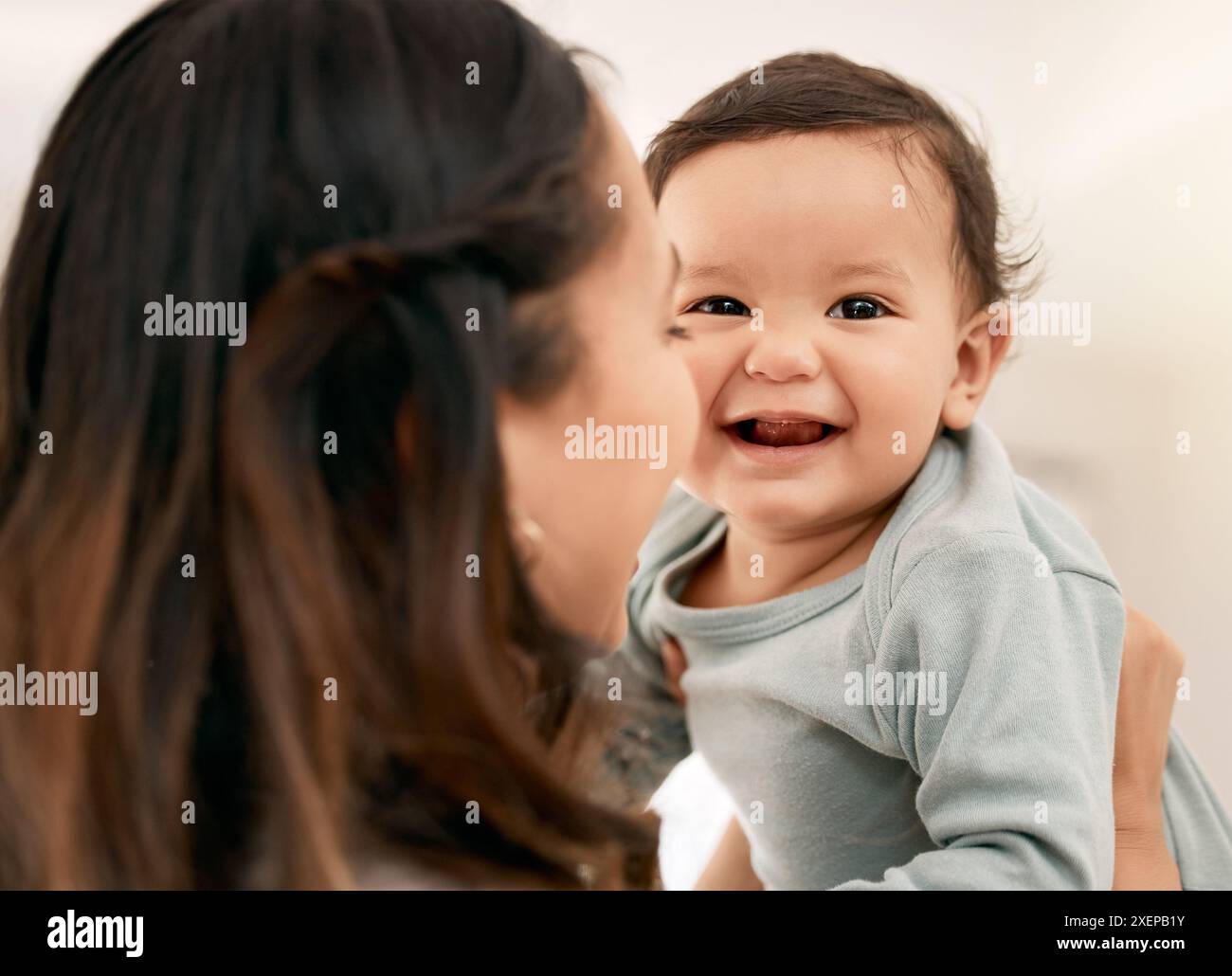 Smile, mother and portrait of baby laughing, playing and family bonding in home together. Mom ...
