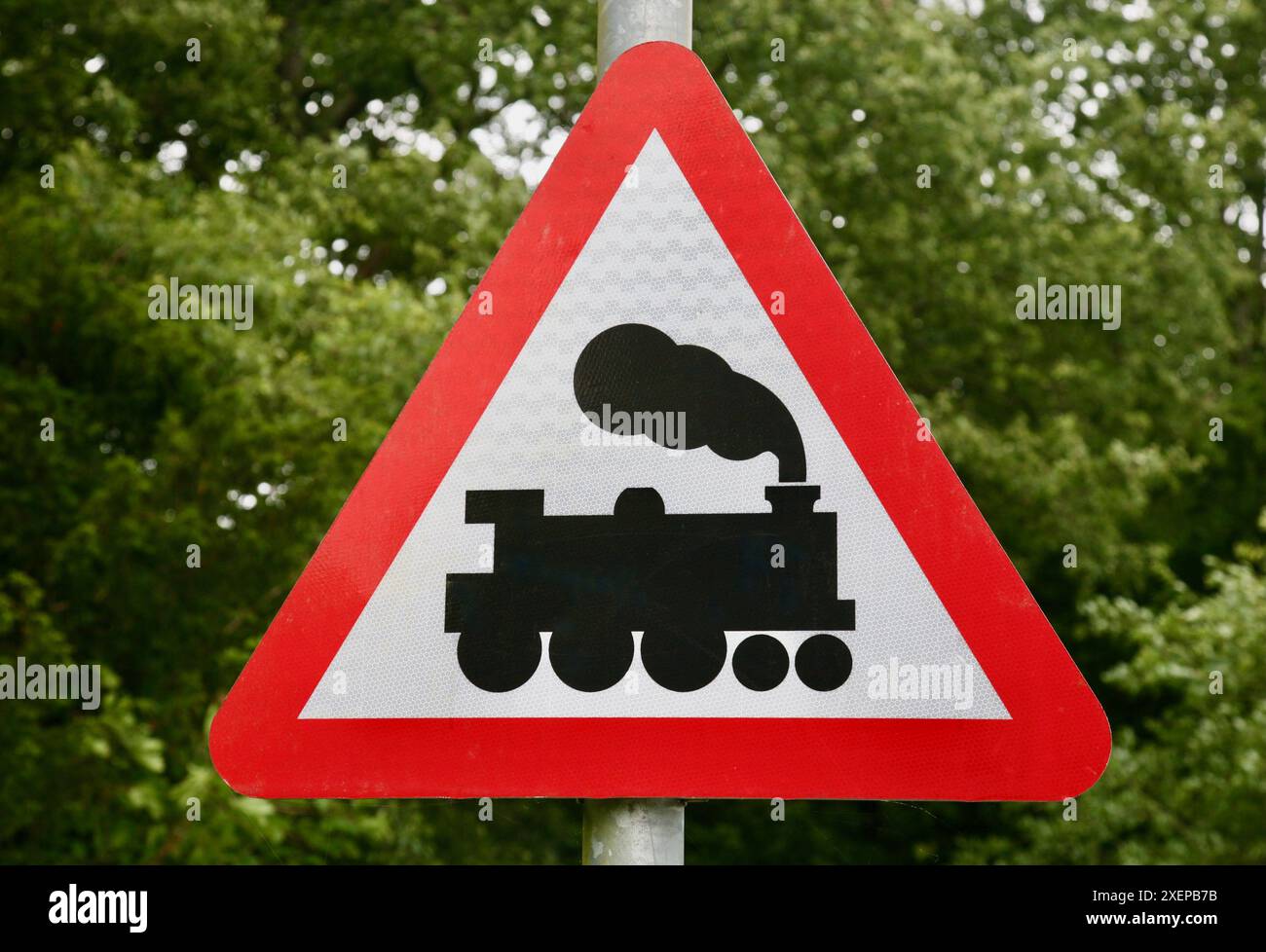 A sign by the railway track, warning the public of approaching steam ...