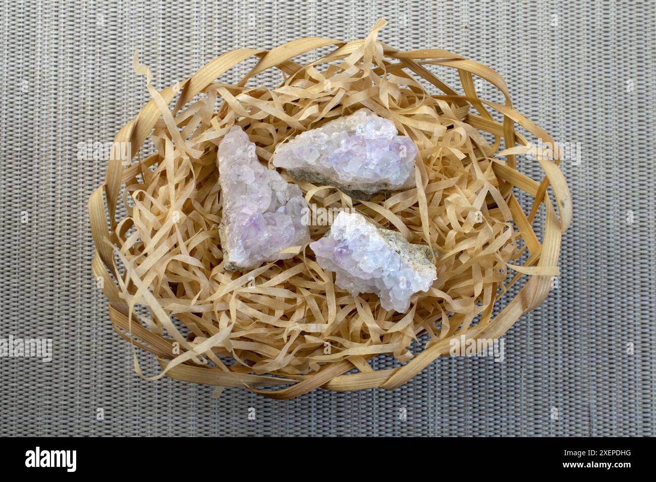 set of various amethyst natural mineral stones and gemstones on grey ...