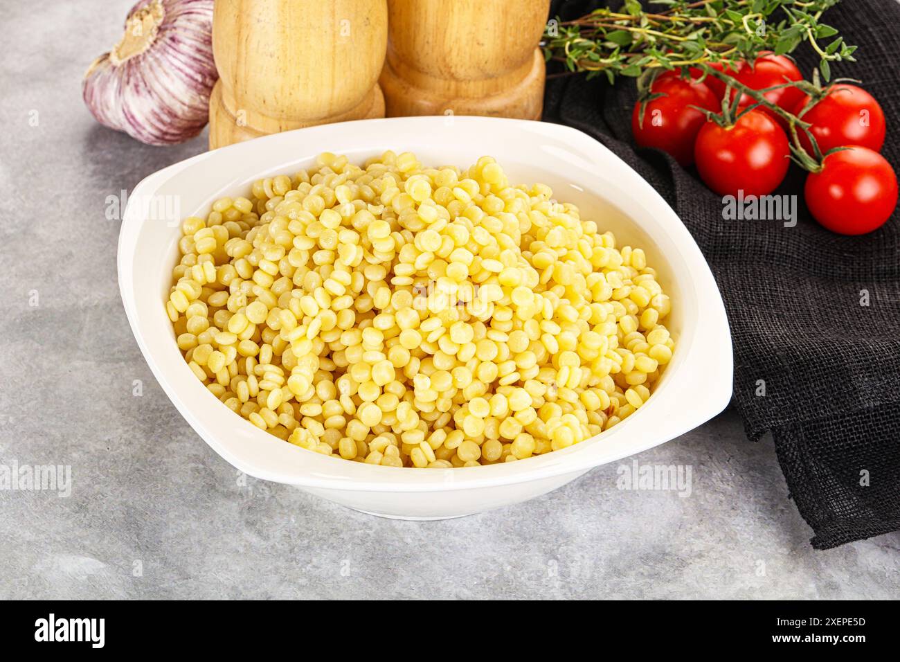 Organic wheat pasta - boiled round ptitim Stock Photo - Alamy