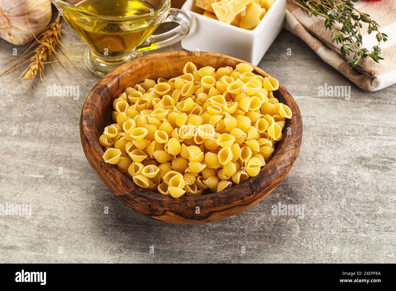 Italian cuisine - dry conchiglie shell pasta Stock Photo - Alamy