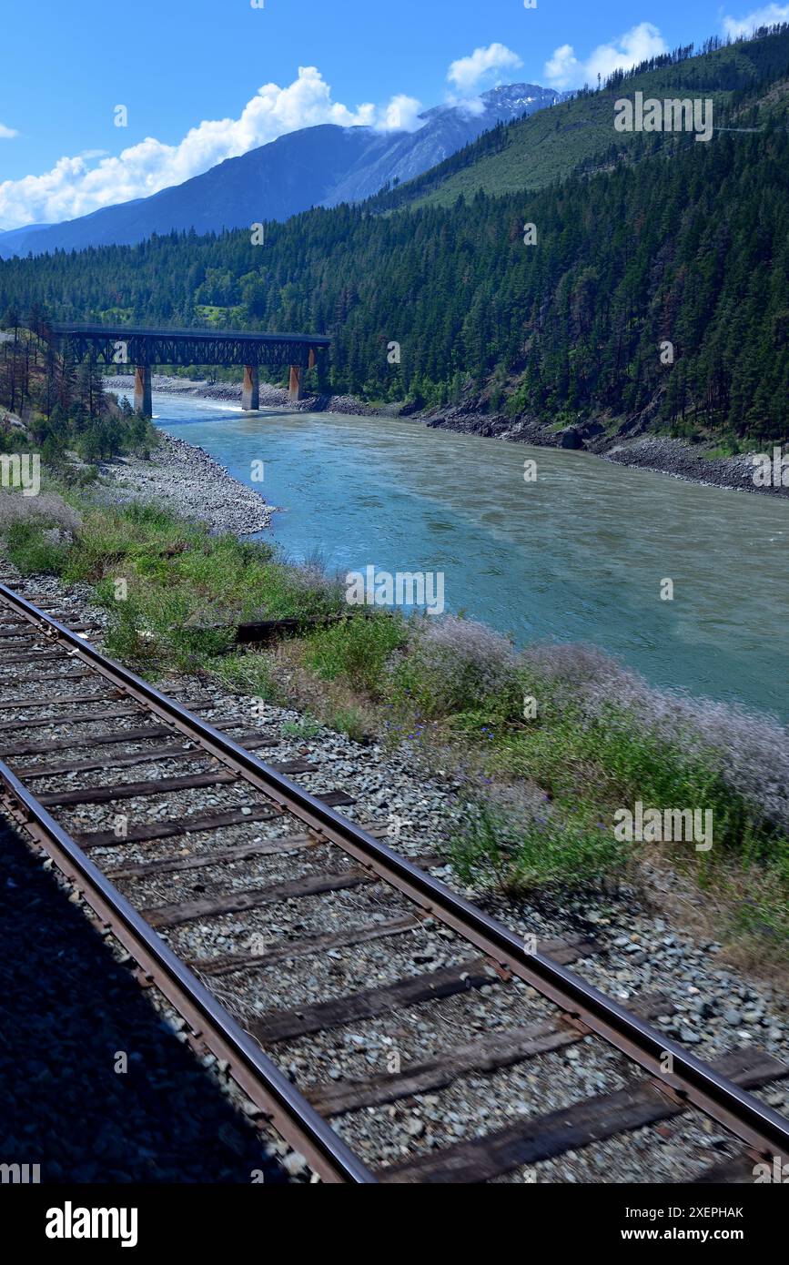 Railway line above the Thompson and Nicola Rivers at rivers meet Stock ...