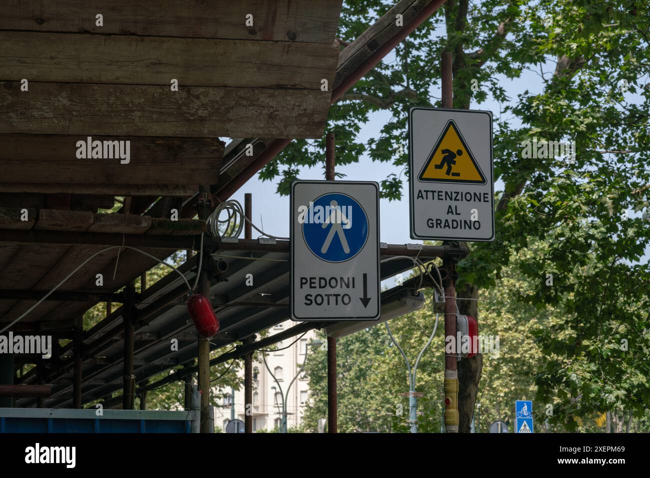 construction site building, pedestrian crossing under scaffolding on a ...