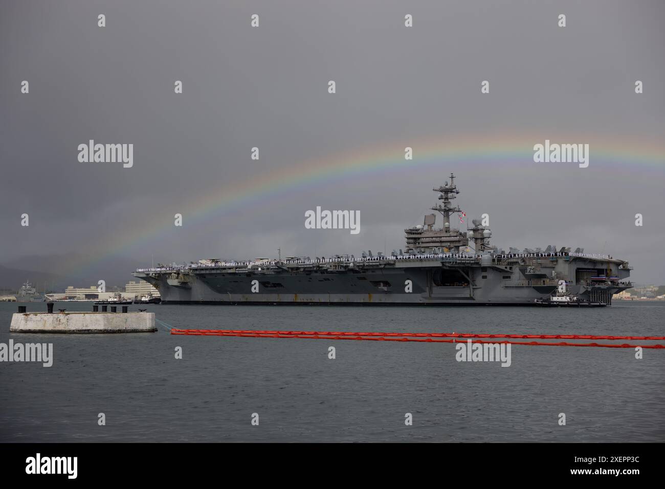 The Nimitz-class aircraft carrier USS Carl Vinson (CVN 70) arrives at Joint Base Pearl Harbor ...