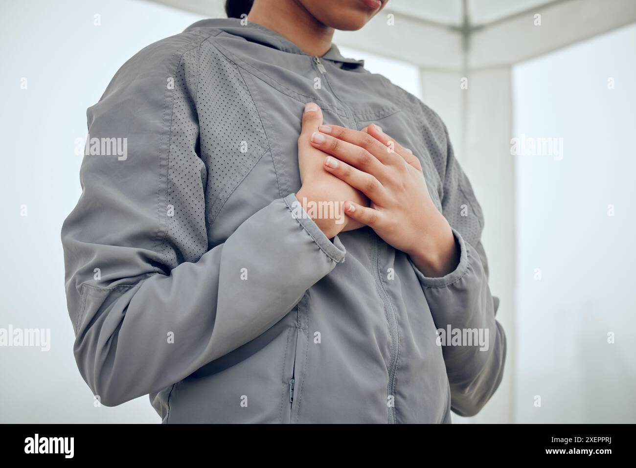 Chest, hands and heart attack with fitness person in gym for health ...