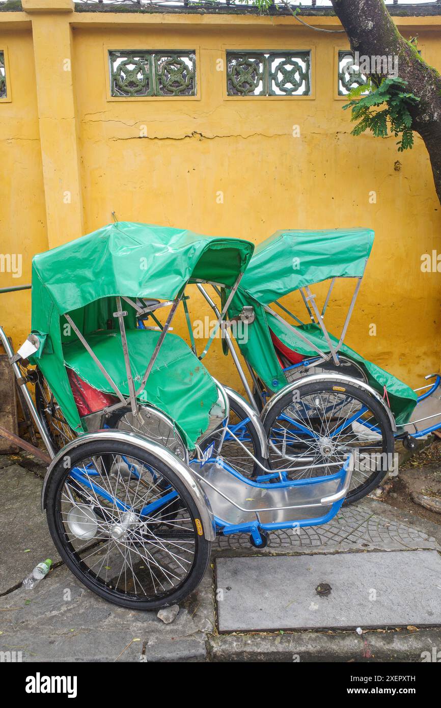 Hoi An, Vietnam - 8 Feb, 2024: Traditional Rickshaw tricycles in Hoi An ...