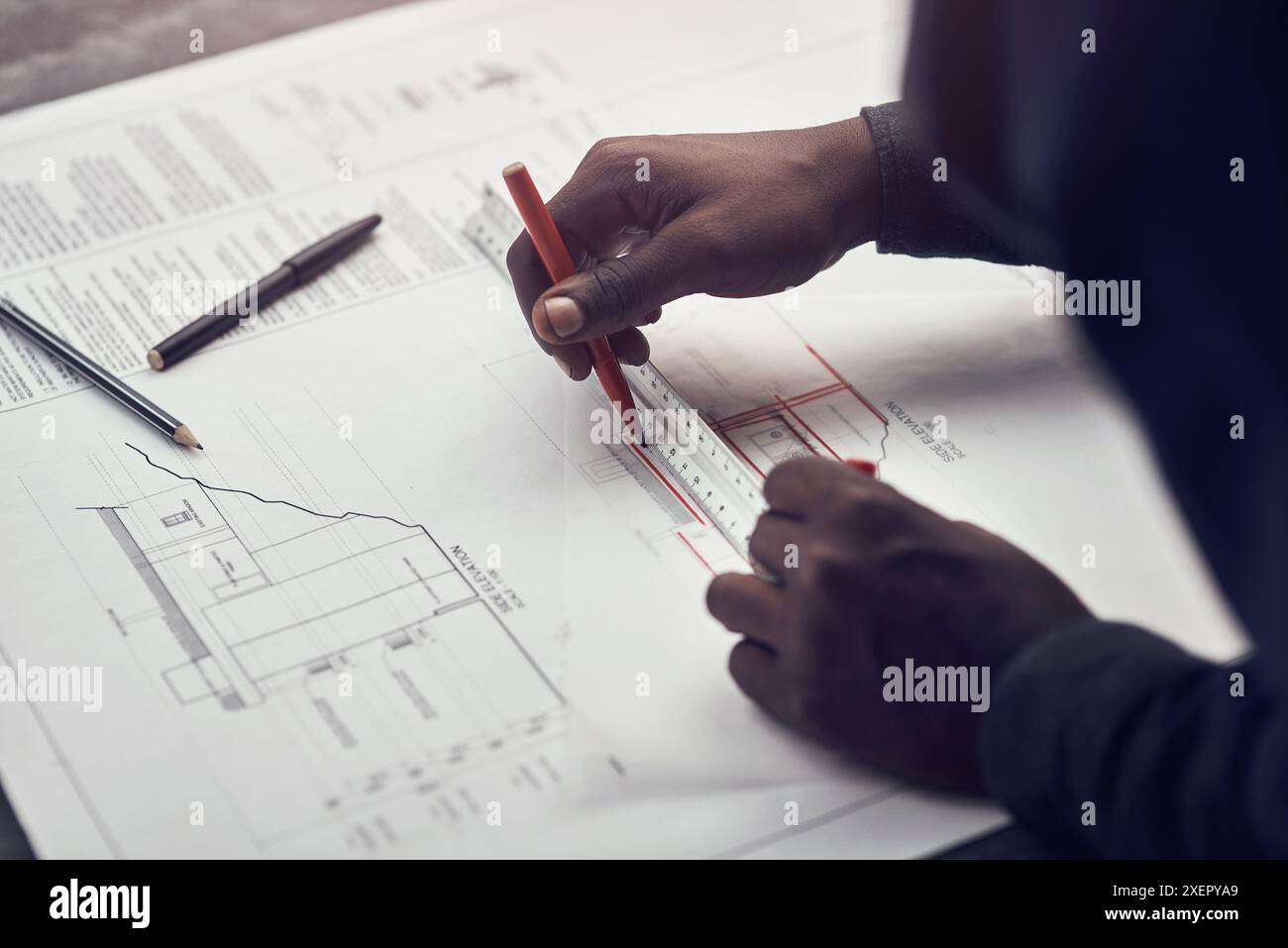 Man, hands and architect to scale blueprint in office, ruler and ...