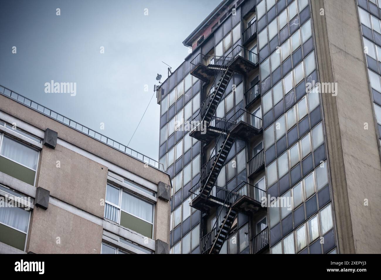 Emergency stairs on an old skyscraper building in North America depict ...