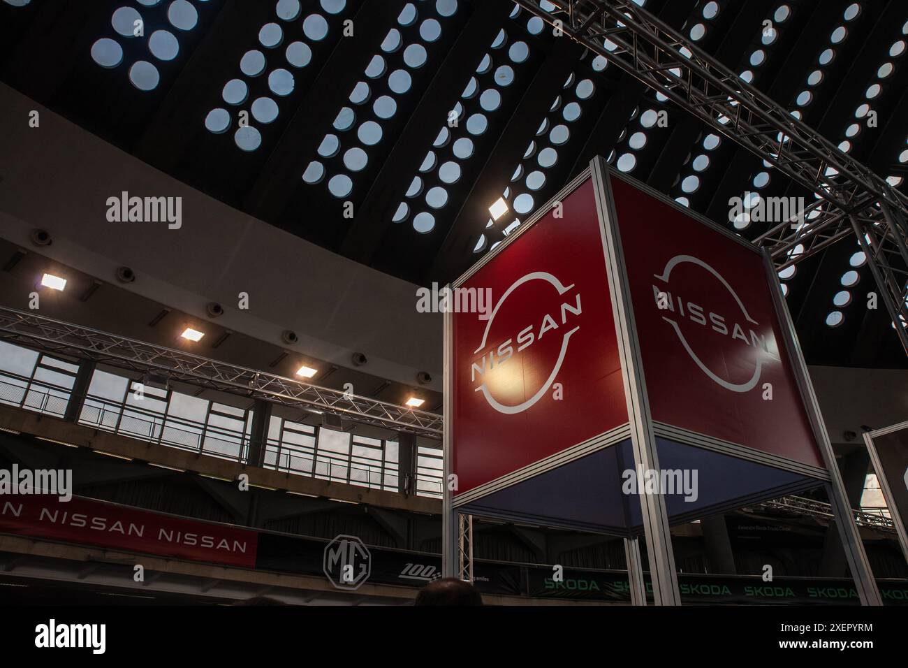 Picture of a sign with the logo of Nissan on a car dealership in ...