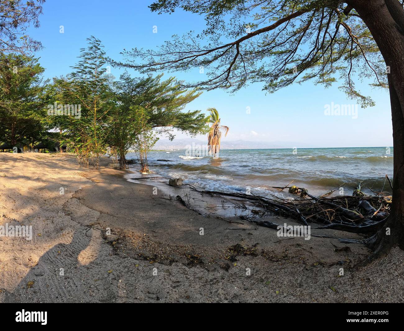 Burundi Bujumbura lake Tanganyika, windy cloudy sky and sand beach at ...