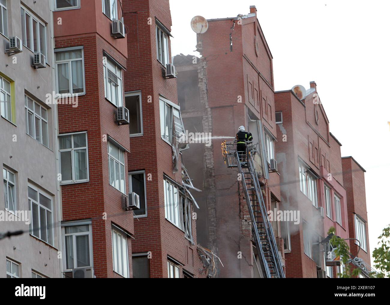 Woman puts out fire hi-res stock photography and images - Alamy