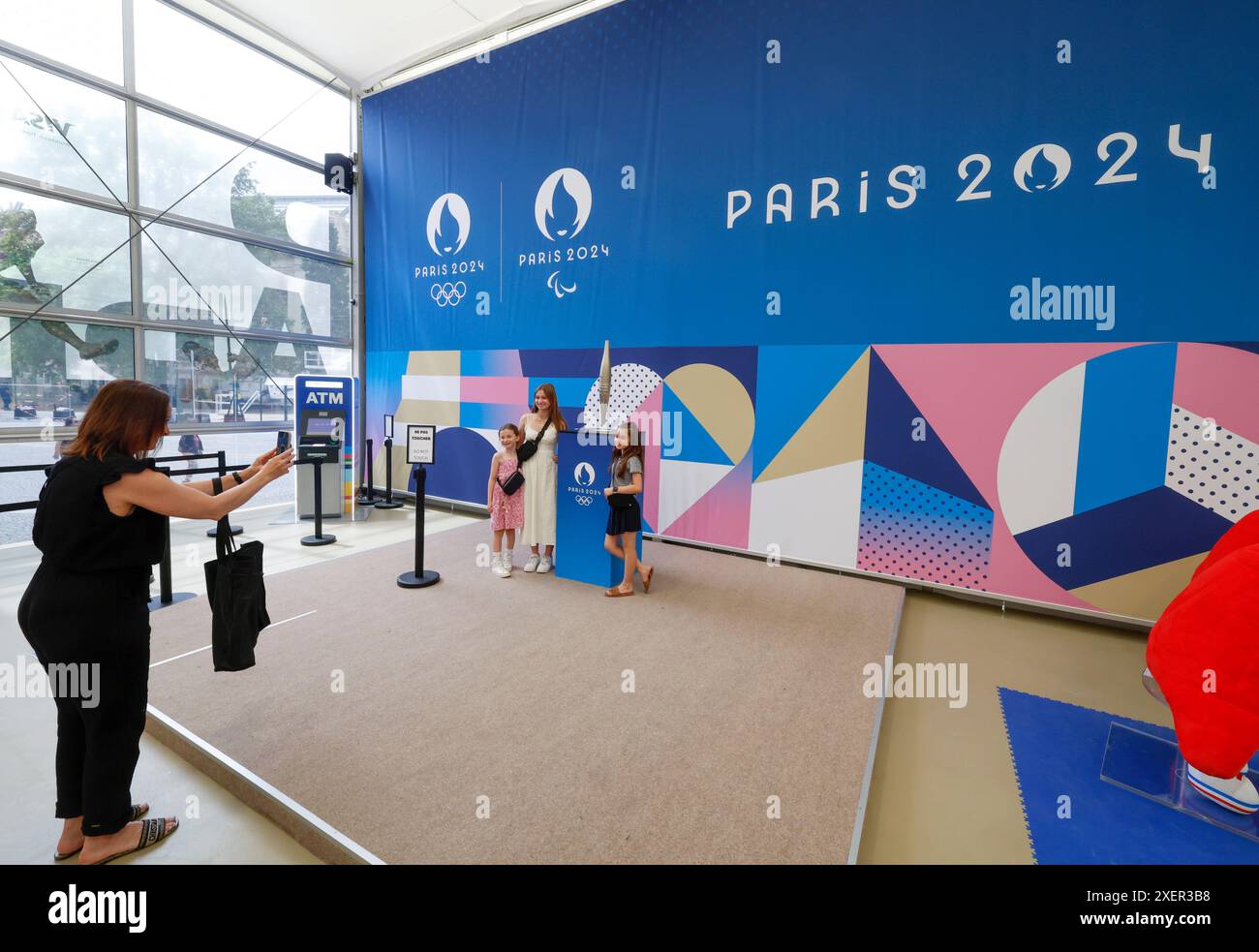 PARIS 2024 MEGASTORE OPENS ON THE CHAMPS ELYSEES Stock Photo - Alamy