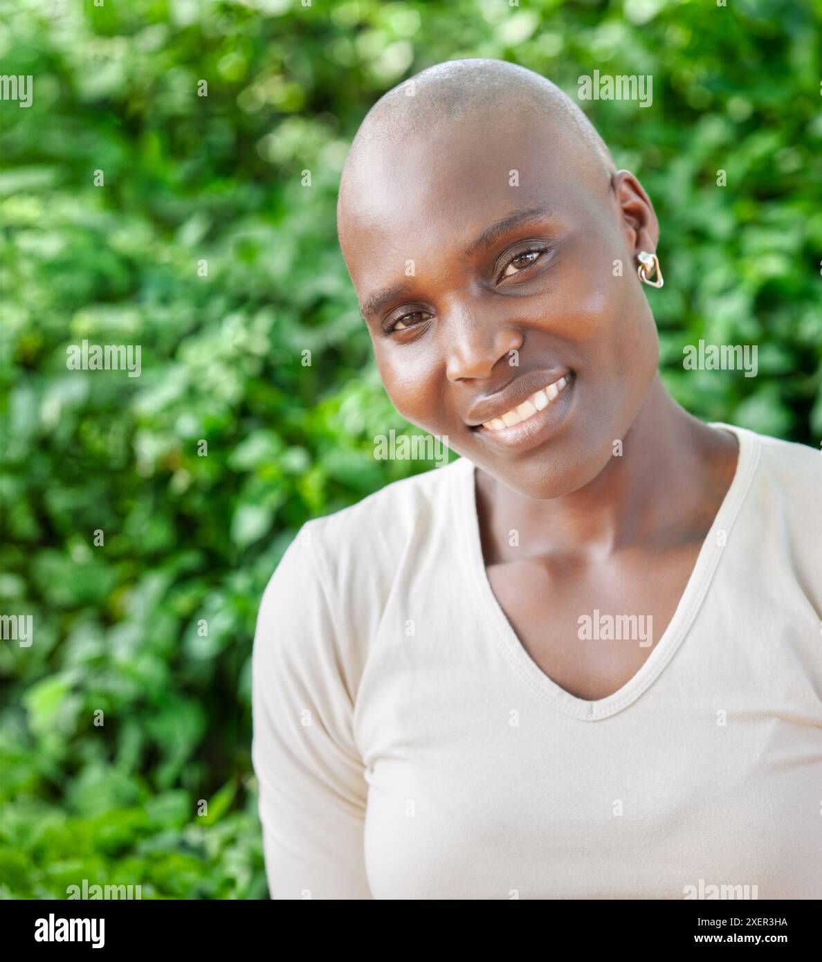 portrait african american woman alone, shaved head bald ,outdoors Stock ...