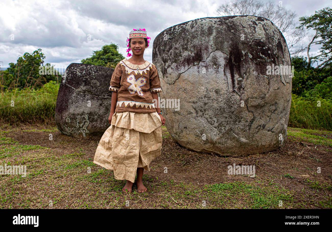 Poso, Indonesia. 29th June, 2024. A girl wears traditional costume made ...