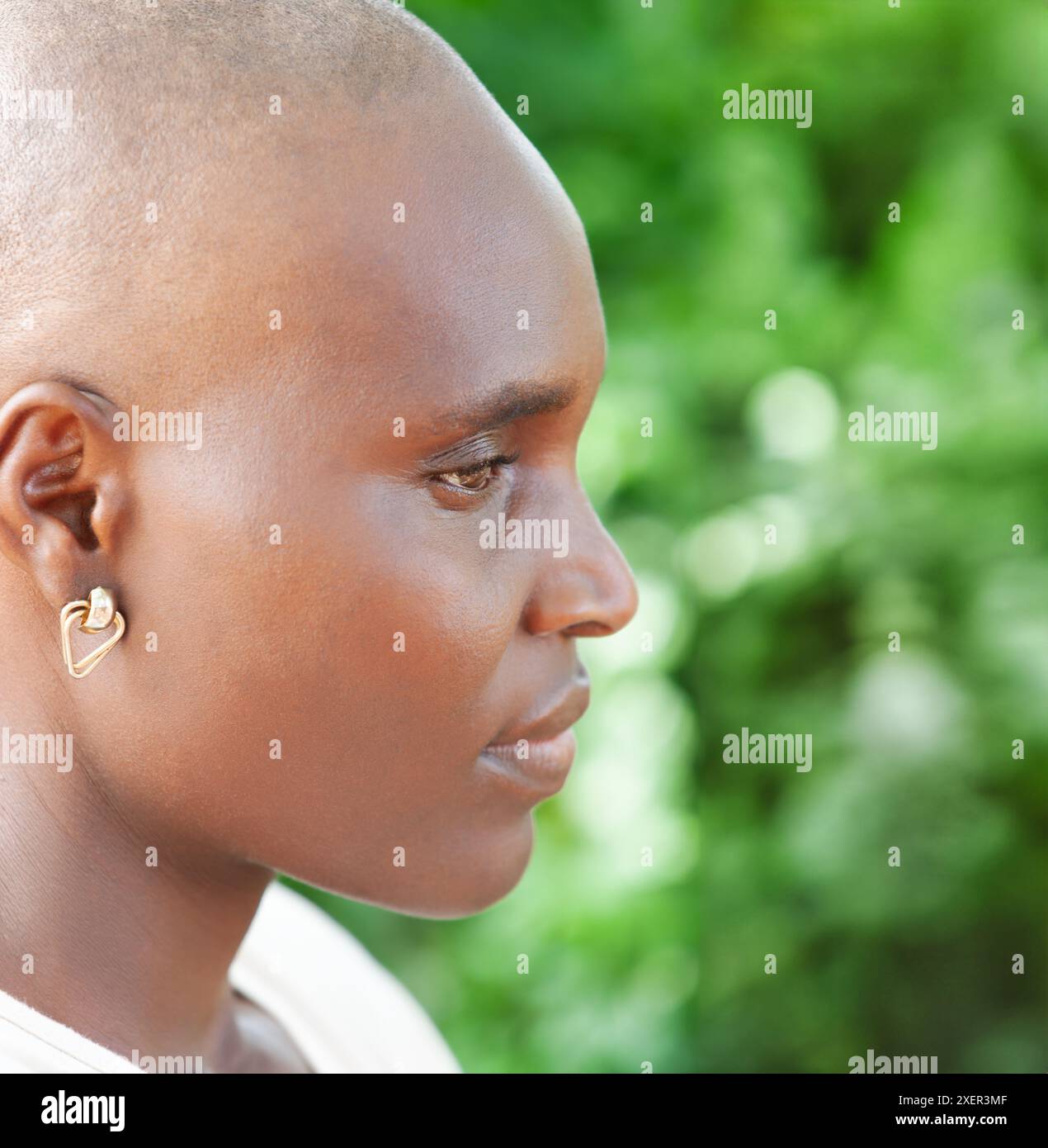 portrait single african american woman shaved head bald Stock Photo - Alamy