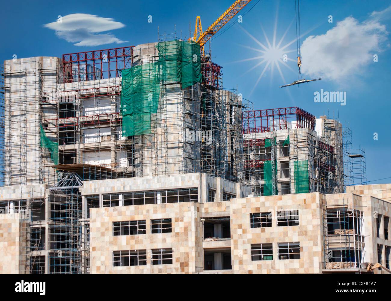 multistory building in construction crane in the back african ...