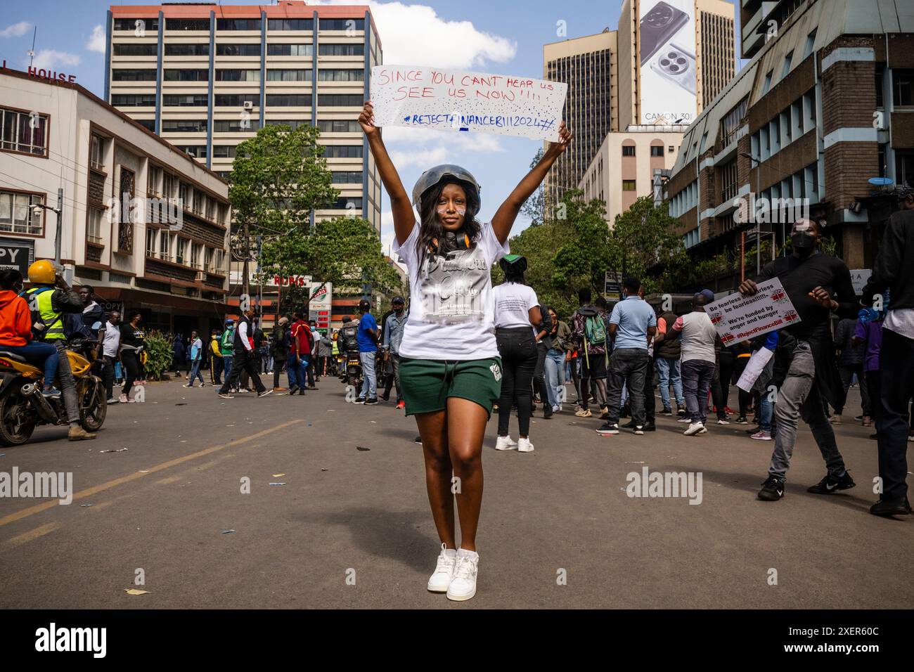 June 25, 2024, Nairobi, Kenya: A protester holds a sign reading ''Since ...