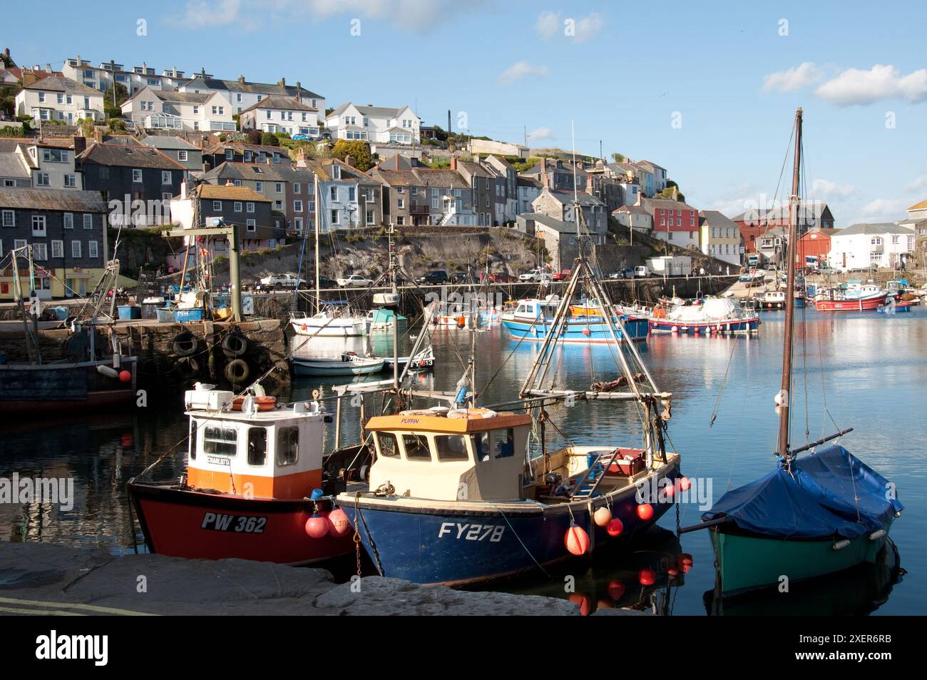 Mevagissey Harbour and Town, Cornwall, UK; The village nestles in a ...