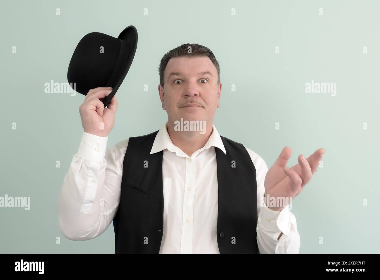 A man from the past, a portrait on a light background. Bowler hat ...